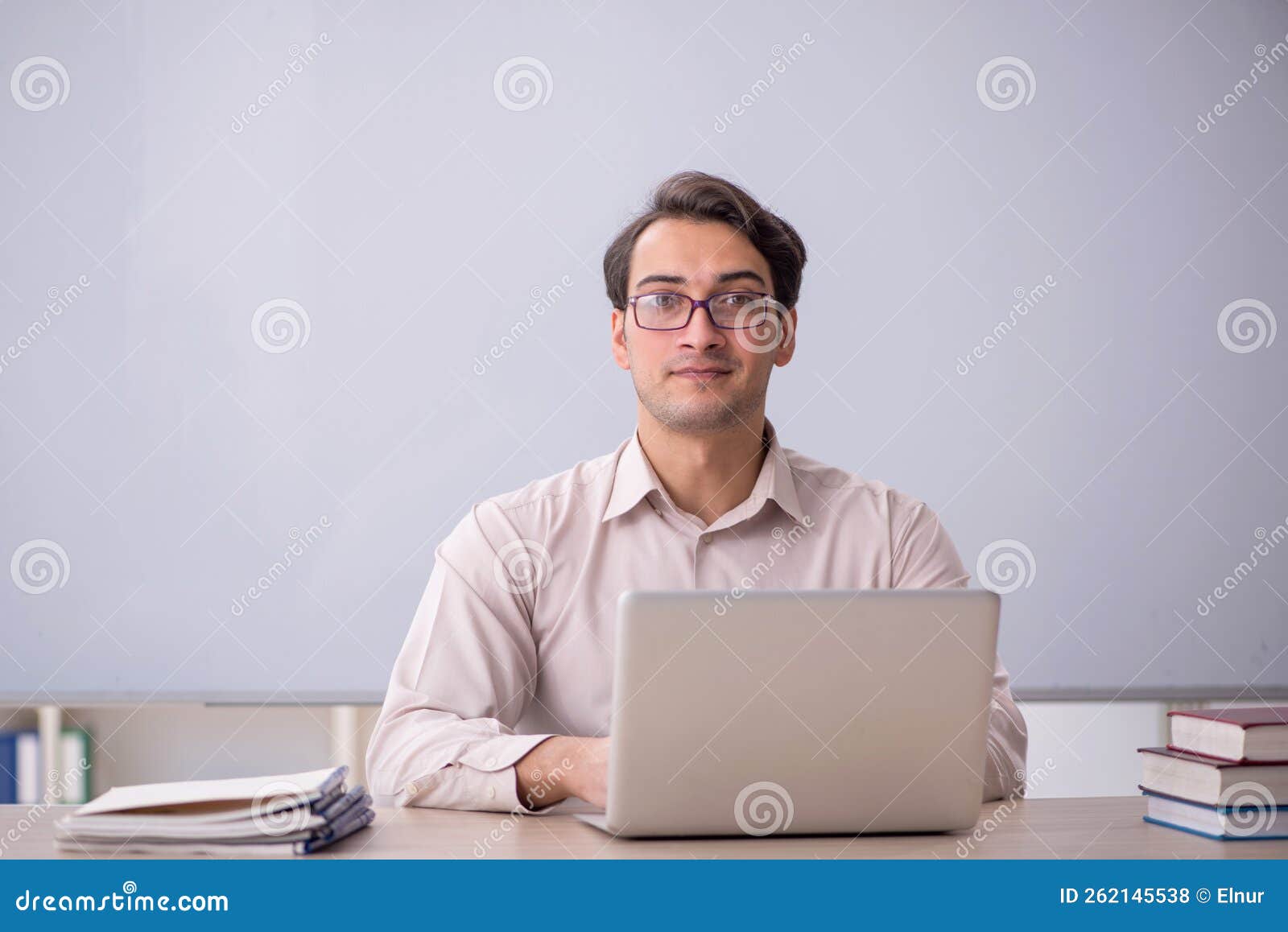 Young Male Student in Telelearning Concept Stock Photo - Image of book ...