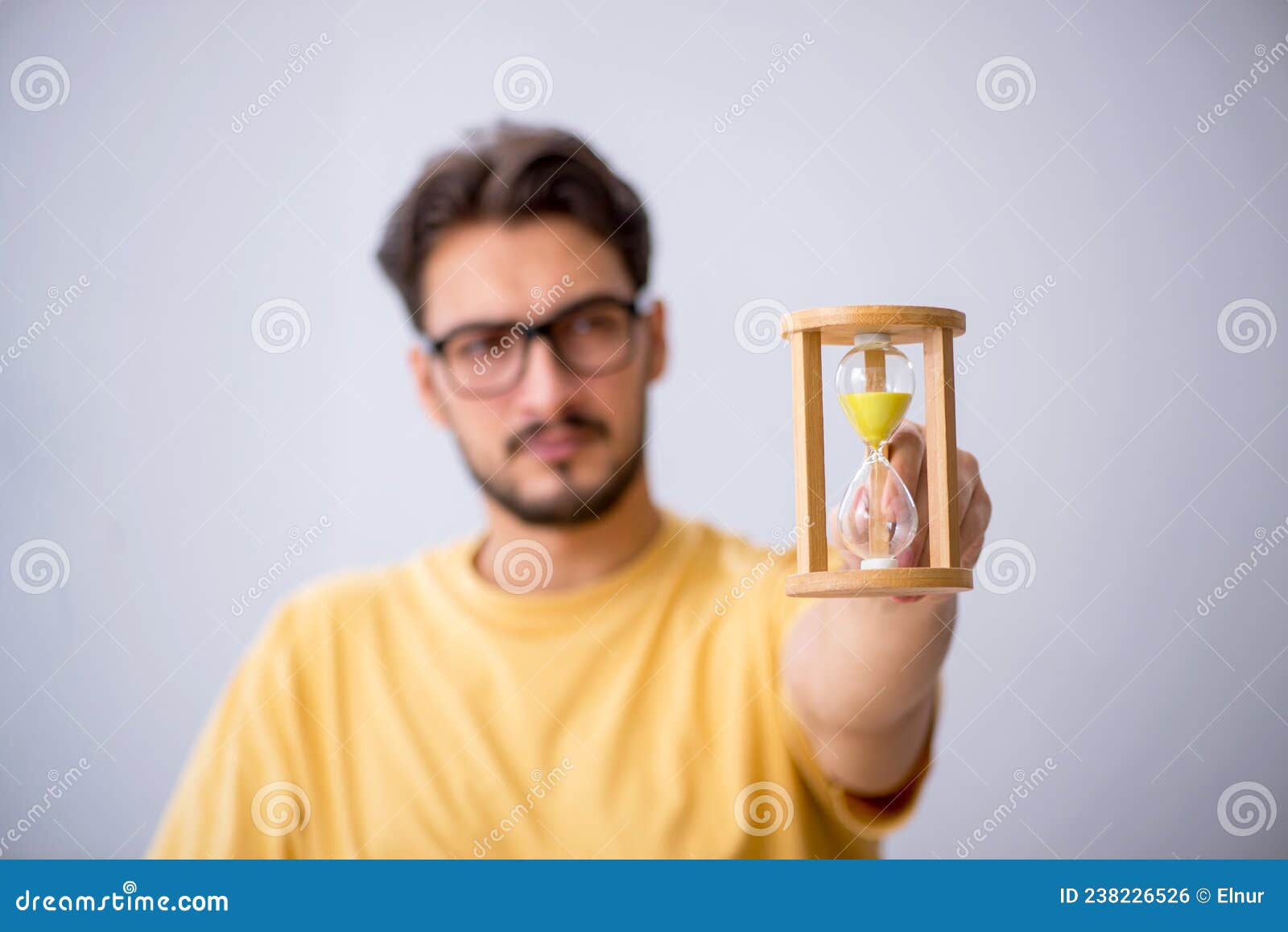 Young Male Student in Time Management Concept Stock Photo - Image of ...