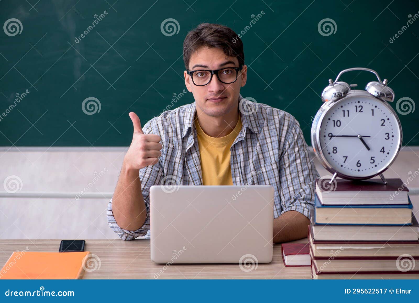 Young Male Student in Time Management Concept Stock Image - Image of ...