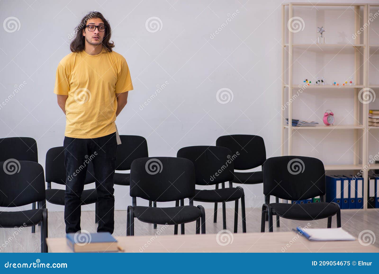 Young Male Student Waiting for Teacher in the Classroom Stock Image ...