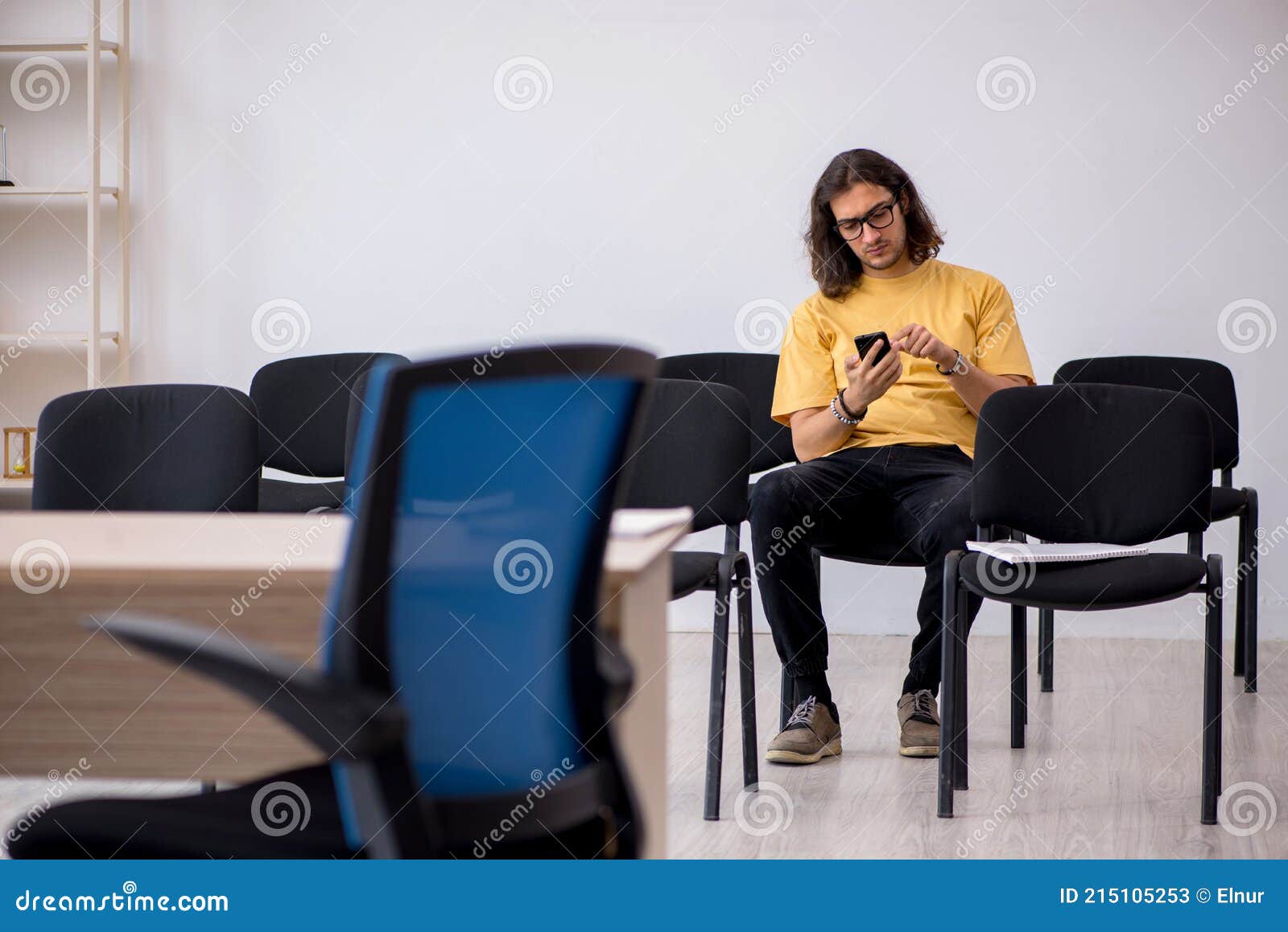 Young Male Student Waiting for Teacher in the Classroom Stock Image ...