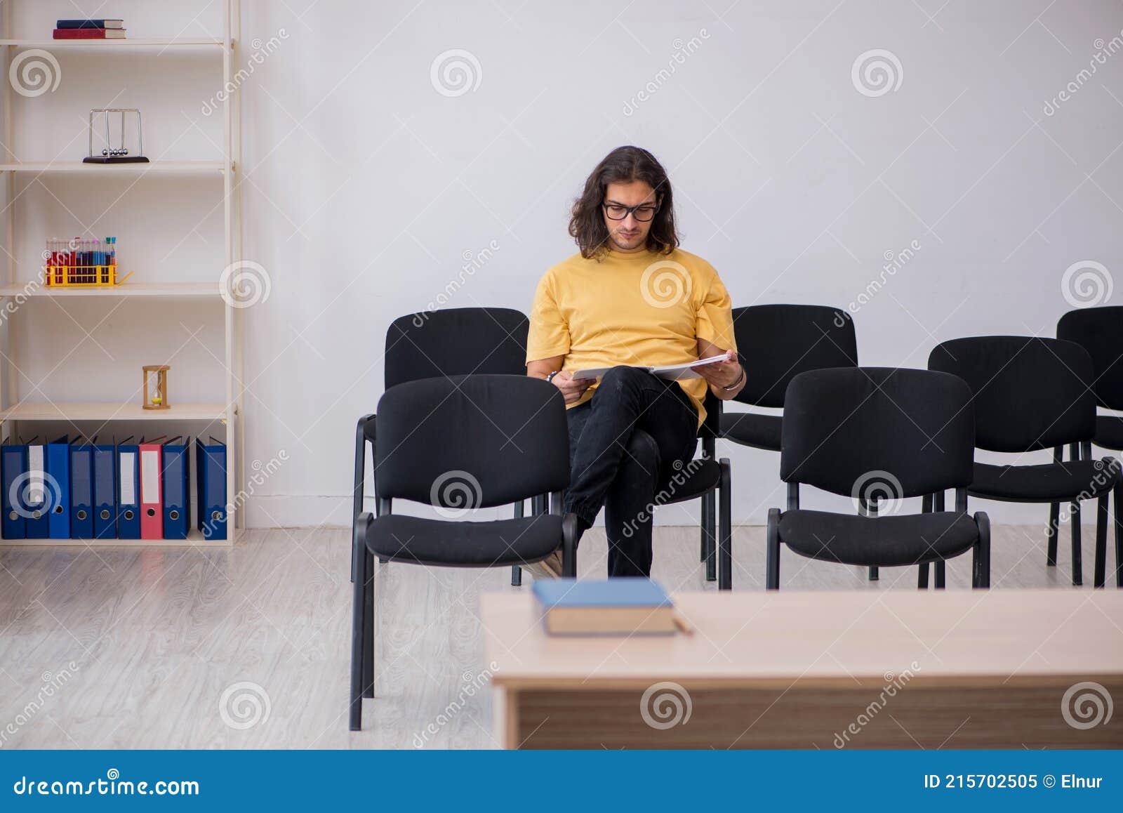 Young Male Student Waiting for Teacher in the Classroom Stock Image ...