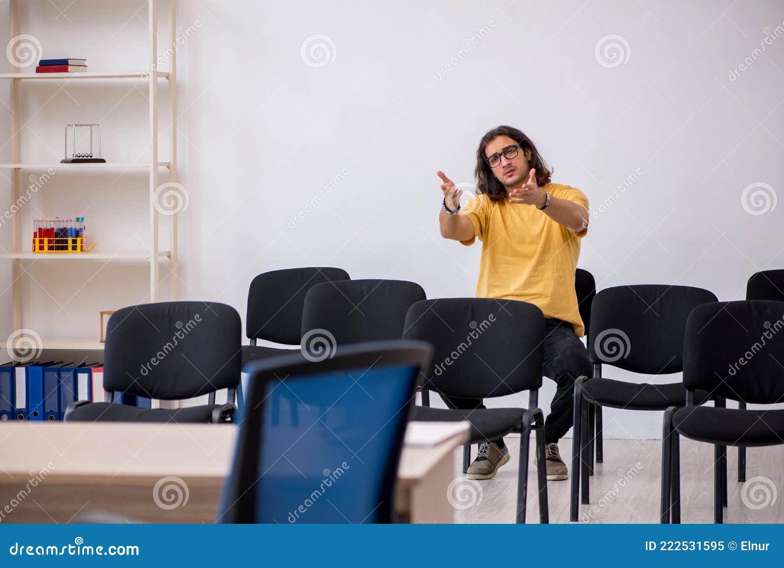 Young Male Student Waiting for Teacher in the Classroom Stock Image ...