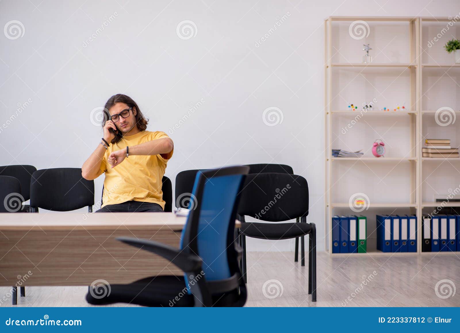 Young Male Student Waiting for Teacher in the Classroom Stock Photo ...