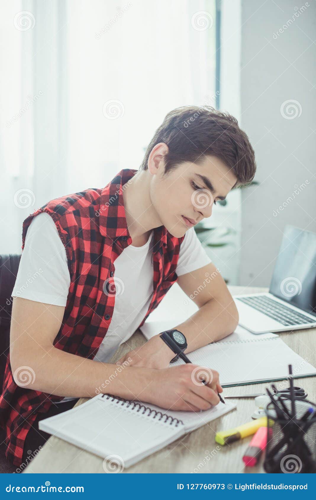 Young Male Student Writing Homework Stock Image - Image of education ...