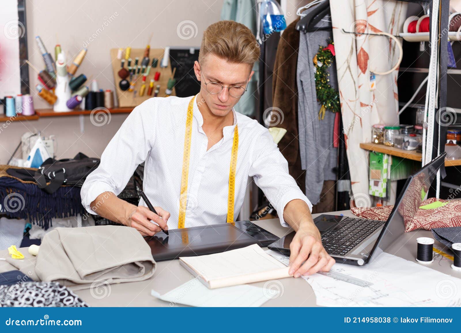 Tailor Creating Pattern Using Graphics Tablet Stock Photo - Image of ...