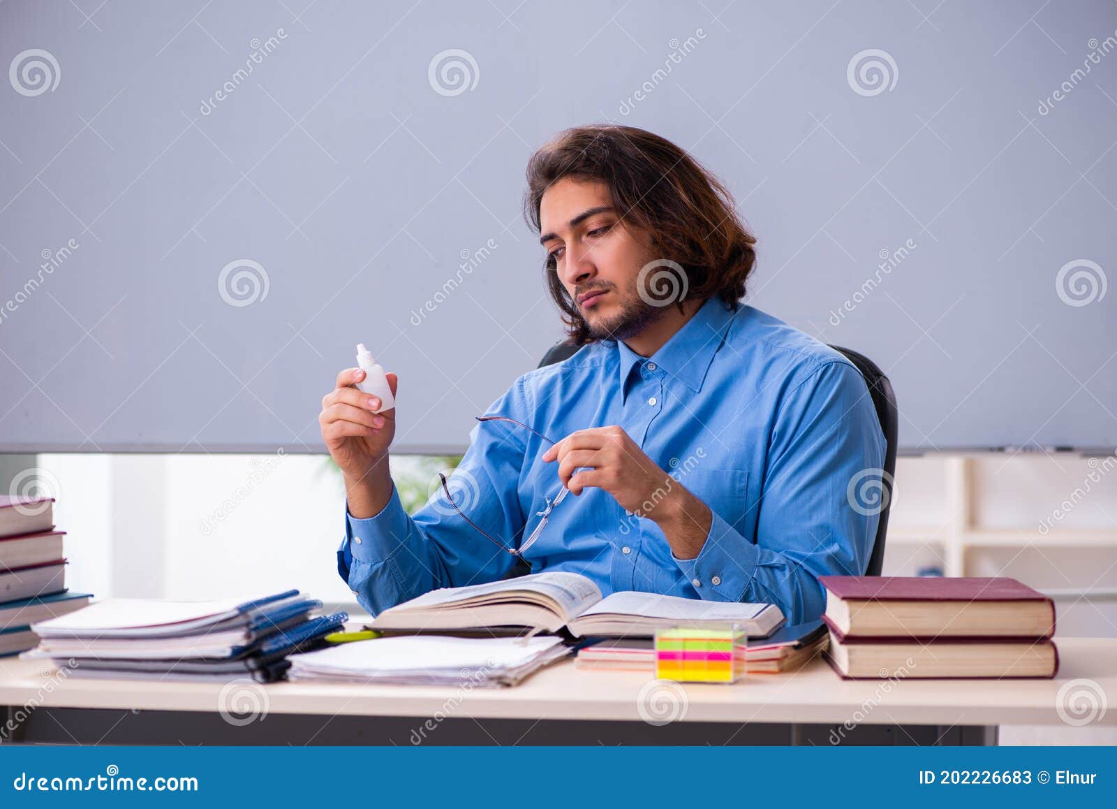Young Male Teacher in the Classroom Stock Image - Image of lecture ...
