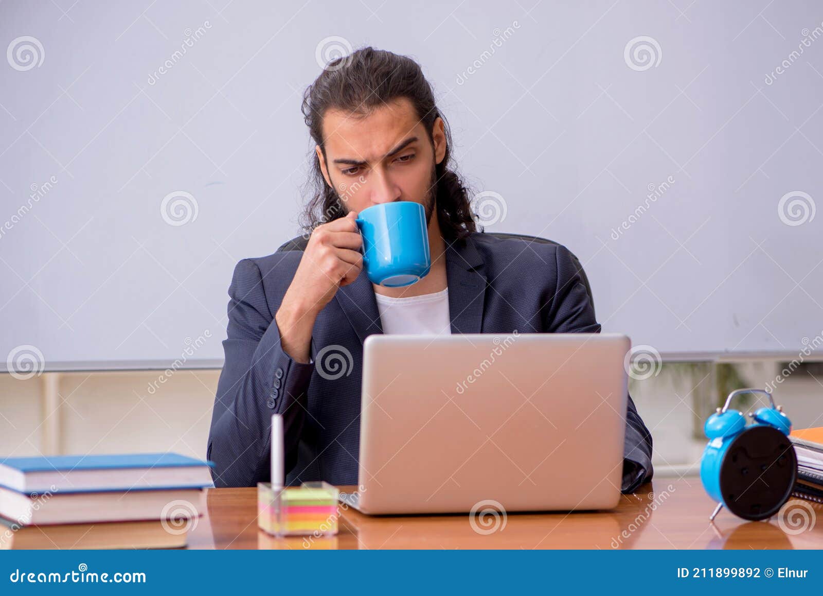 Young Male Teacher in the Classroom Stock Photo - Image of school ...