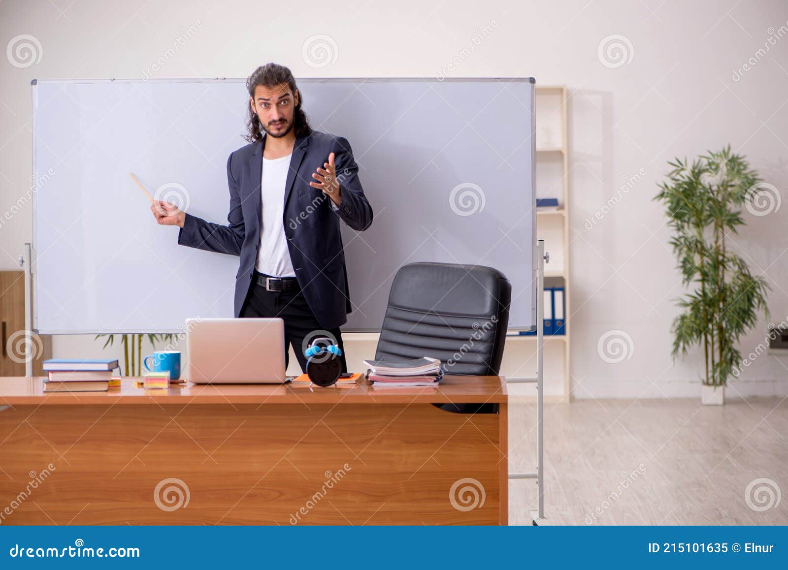 Young Male Teacher in the Classroom Stock Image - Image of classroom ...
