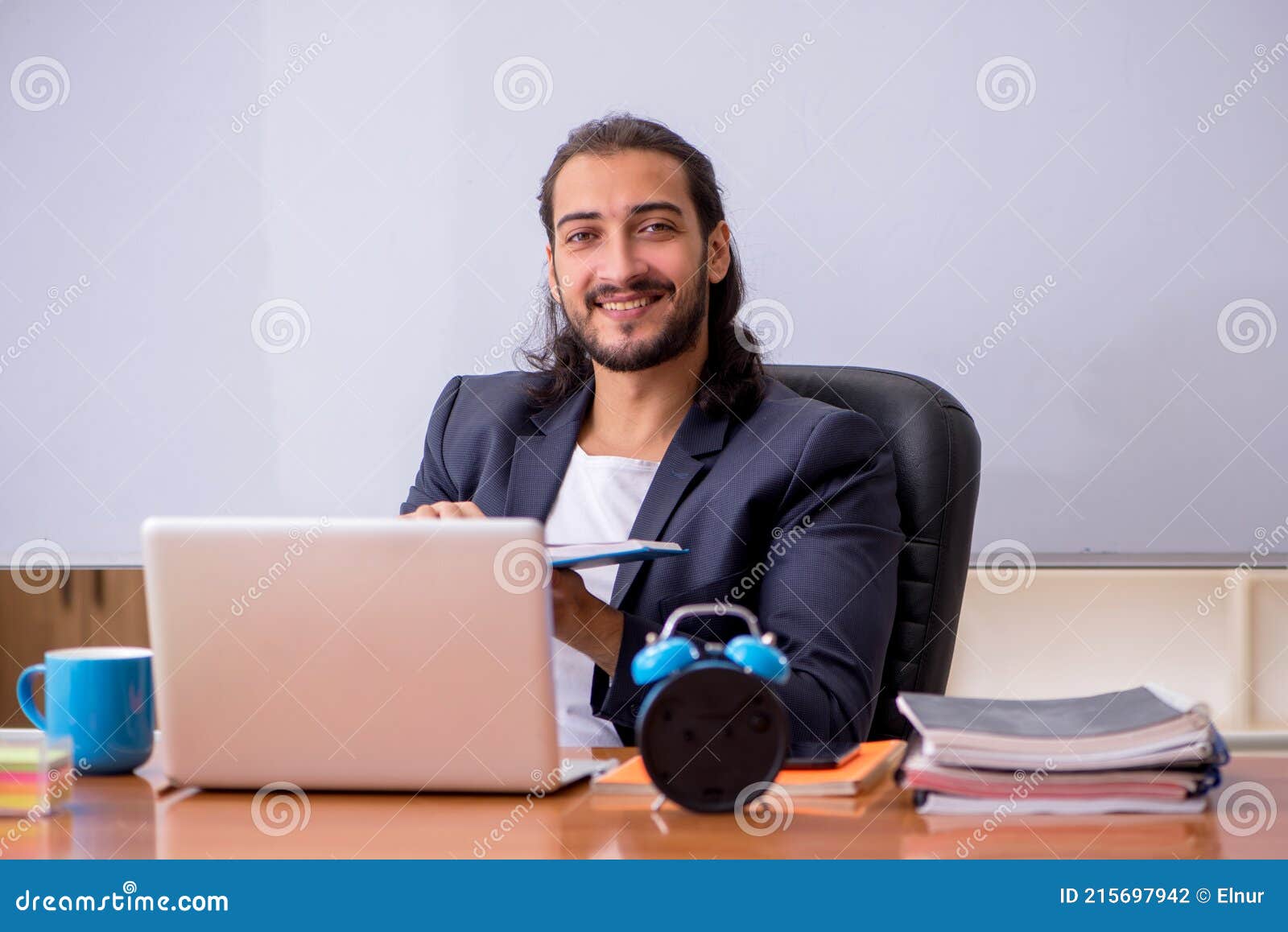 Young Male Teacher in the Classroom Stock Photo - Image of board ...