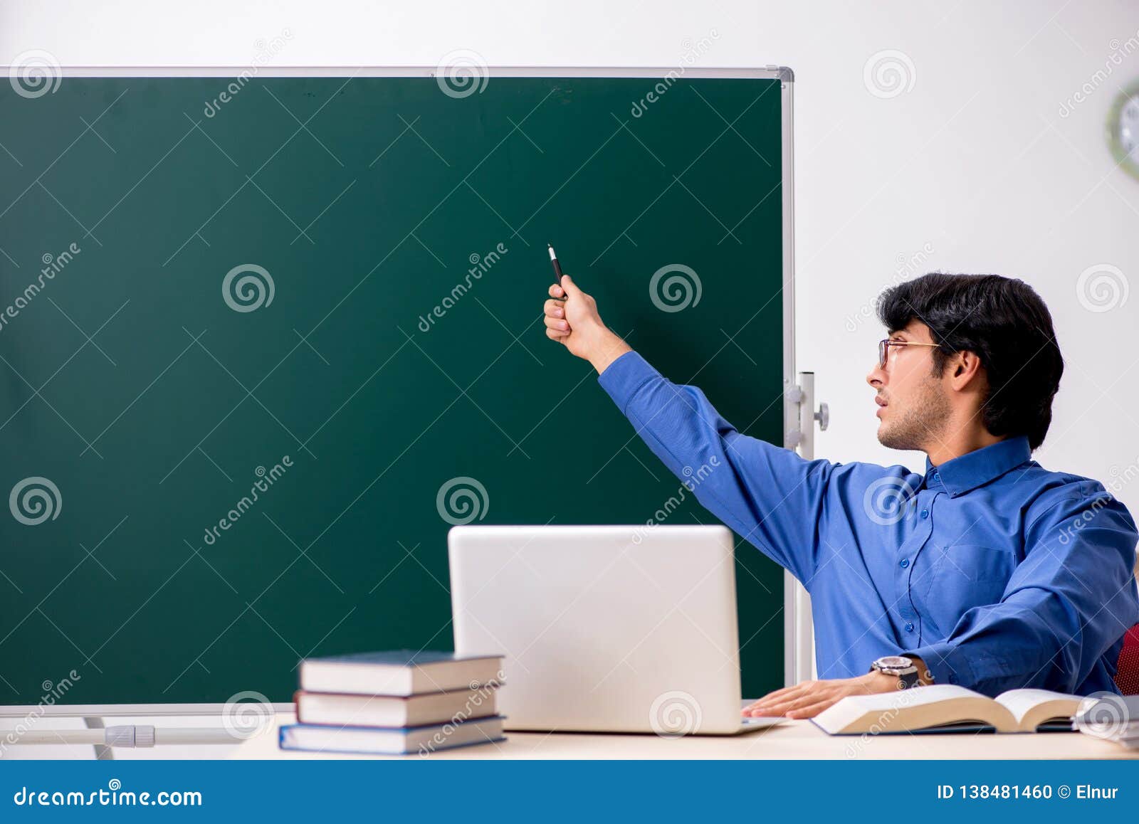 The Young Male Teacher in Front of Chalkboard Stock Photo - Image of ...
