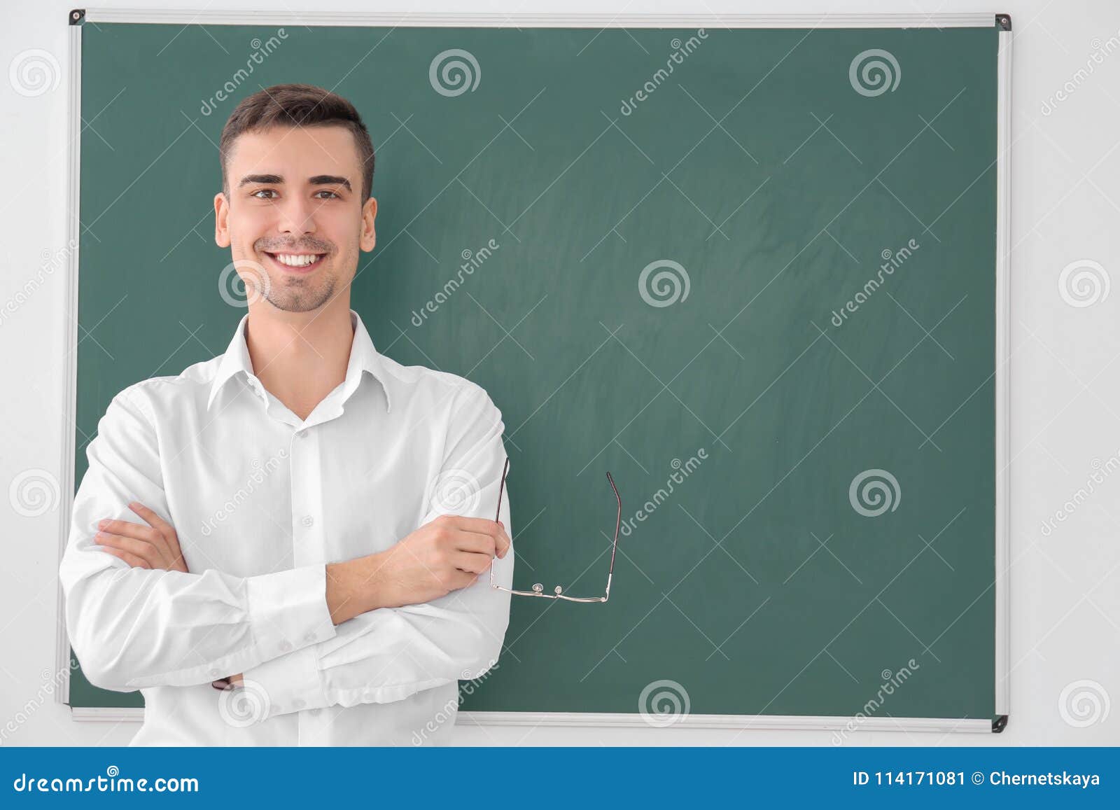 Young Male Teacher Standing Near Blackboard Stock Image - Image of ... Young Male Teacher Standing Near Blackboard Stock Image - Image of ...