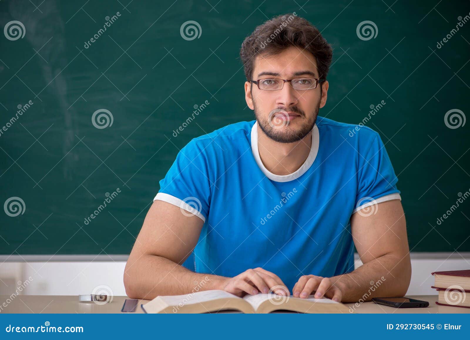 Young Male Teacher Student in Front of Green Board Stock Image - Image ...