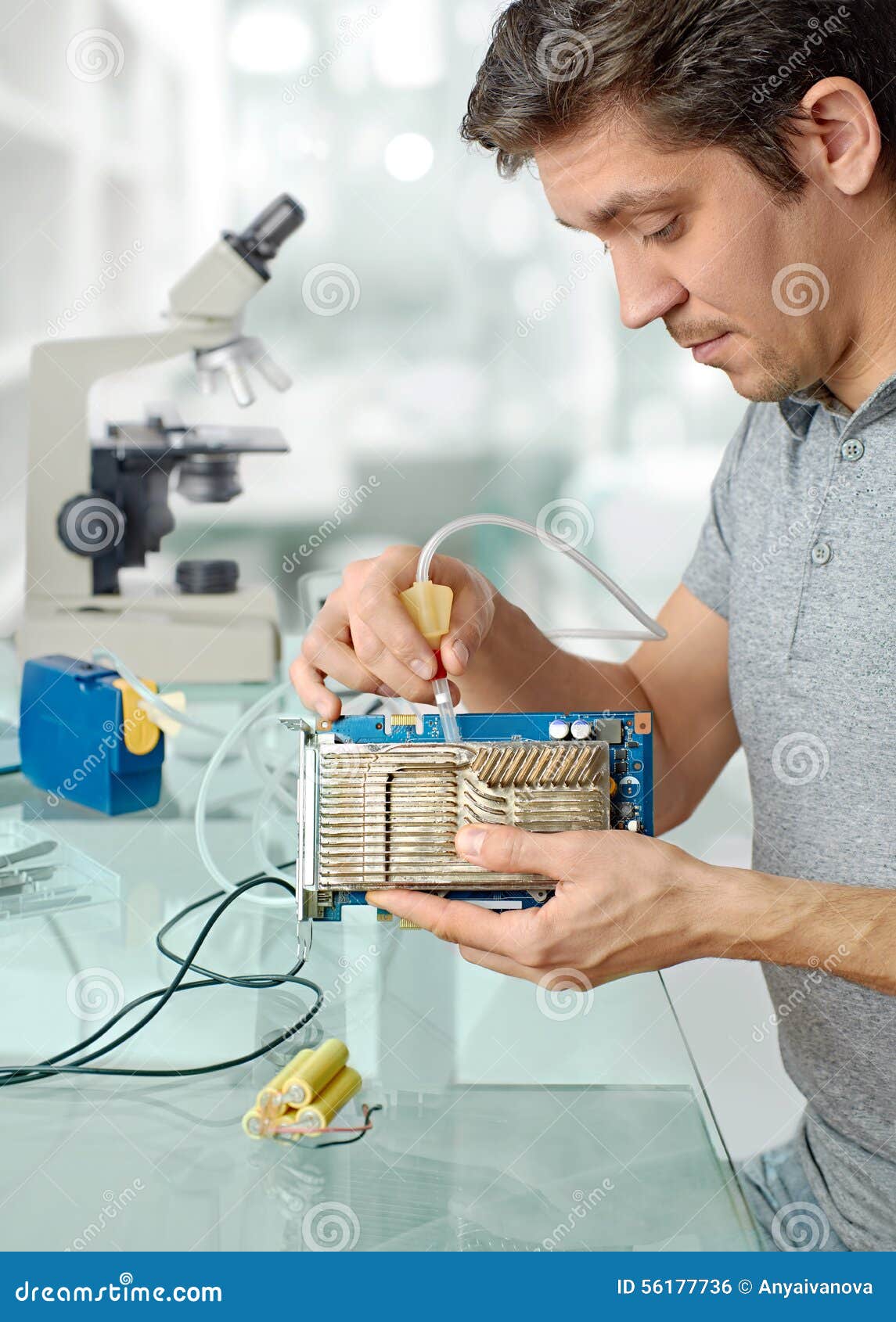 Young Male Tech Cleans Faulty Computer Processor Stock Photo - Image of ...