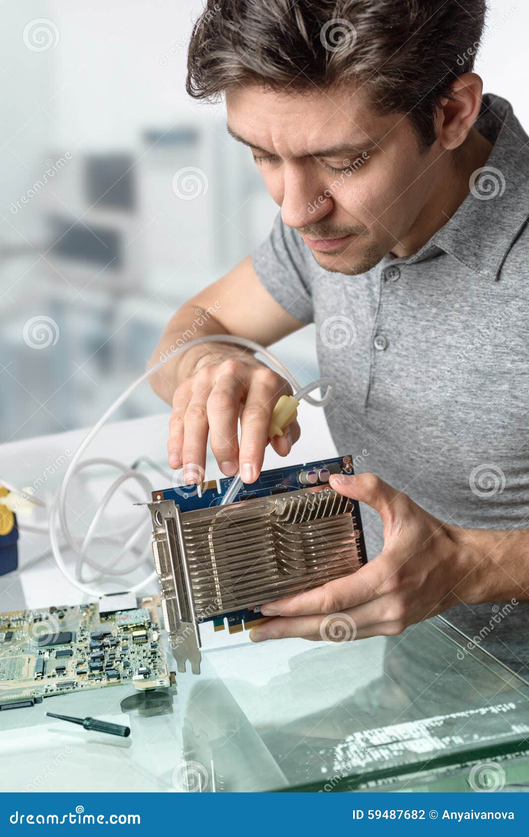 Young Male Tech Cleans Faulty Computer Processor Stock Photo - Image of ...