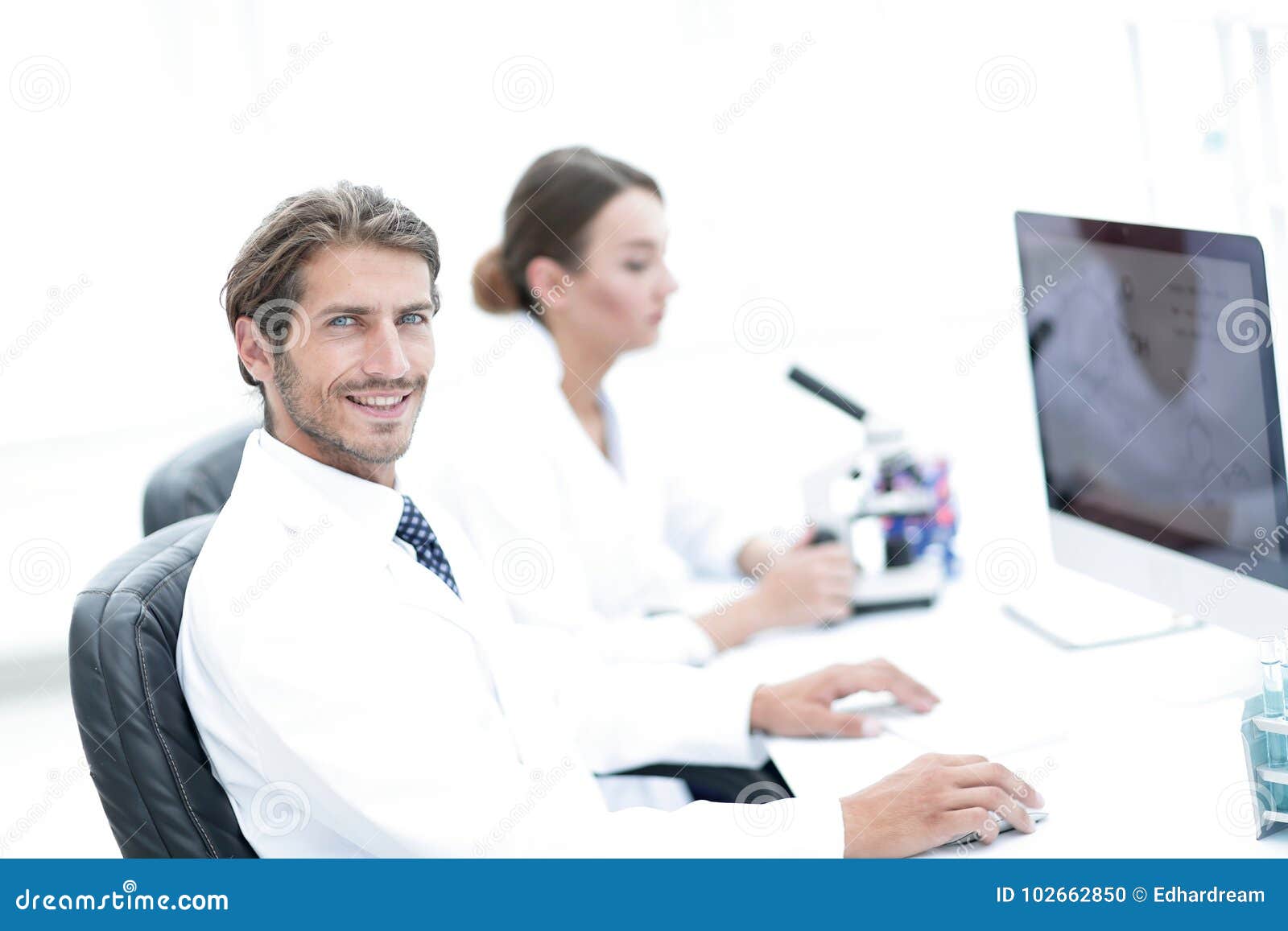 Young Male Technician Working on Computer in Laboratory Stock Photo ...