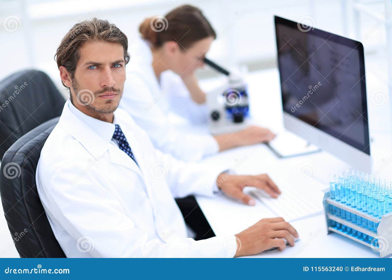Young Male Technician Working on Computer in Laboratory Stock Photo ...