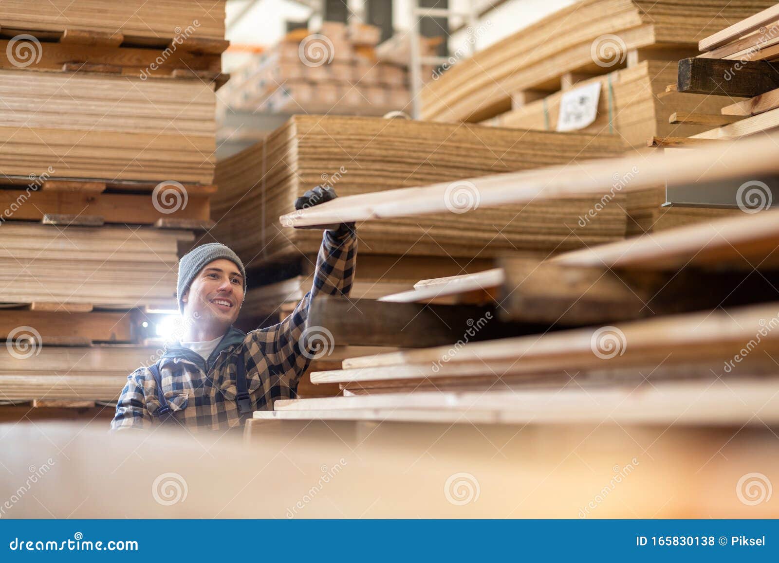 Young Male Worker in Timber Warehouse Stock Photo - Image of plywood ...