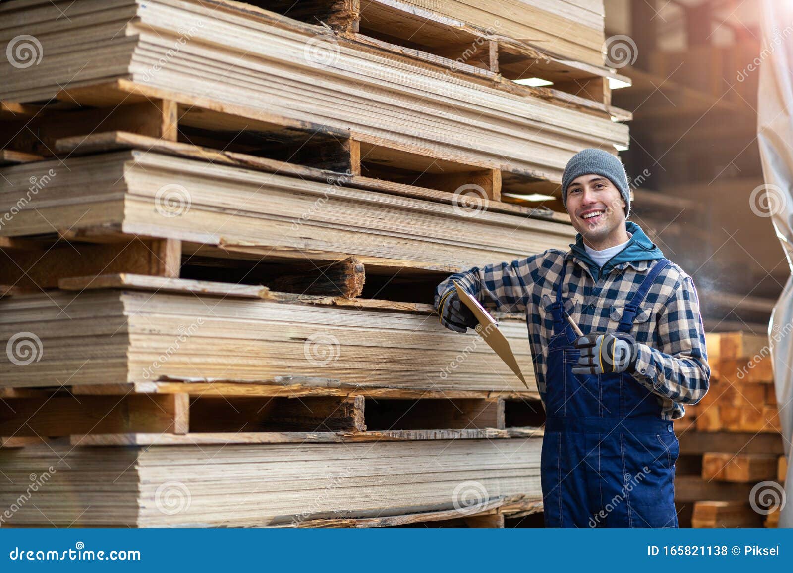 Young Male Worker in Timber Warehouse Stock Photo - Image of class ...