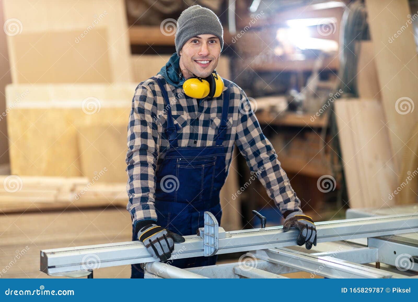 Young Man Working at a Timber Warehouse Stock Image - Image of business ...