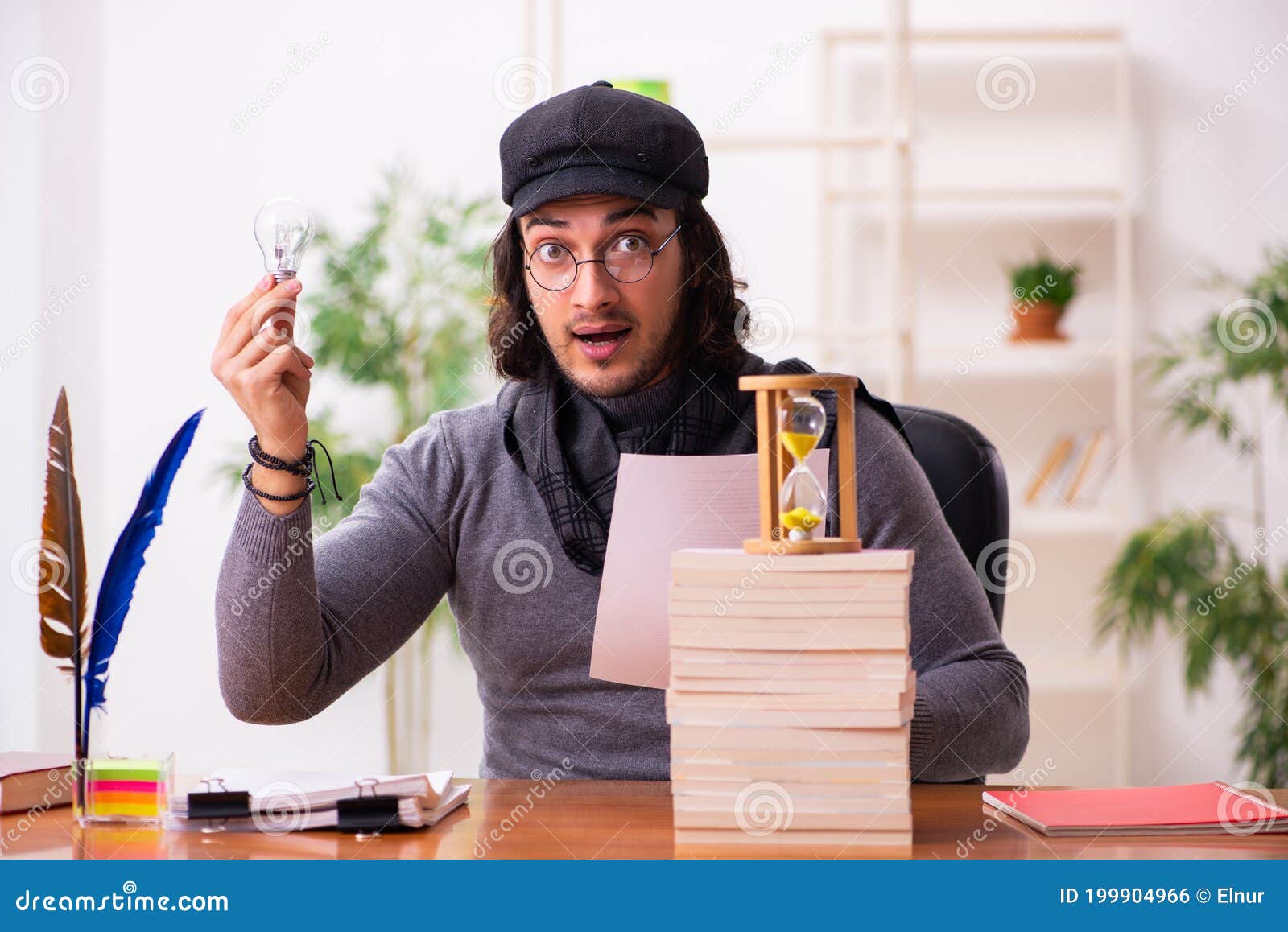 Young Male Writer in Time Management Concept Stock Photo - Image of ...