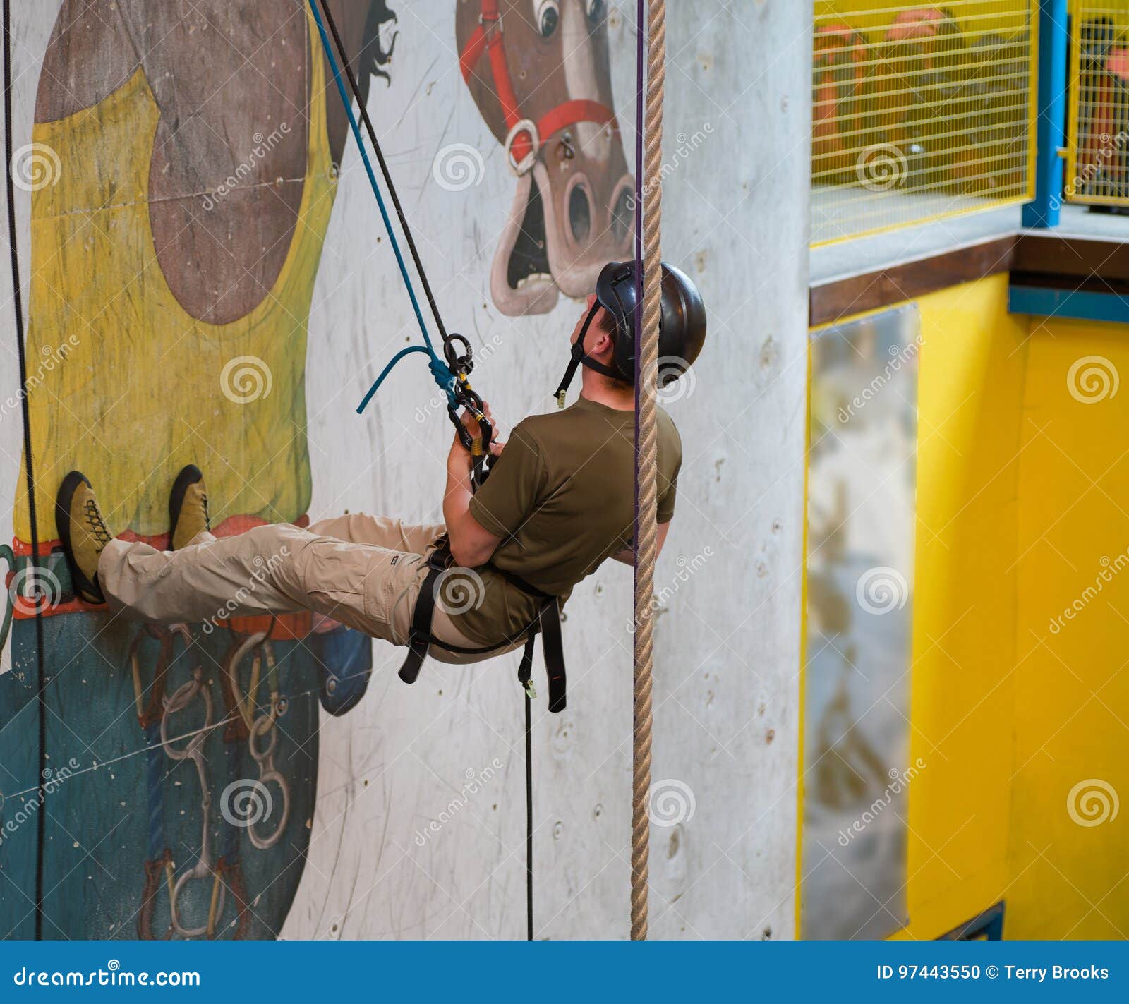 Young Man Abseiling editorial image. Image of courageous - 97443550
