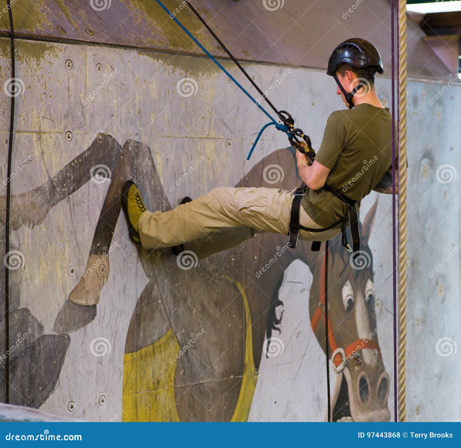 Young Man Abseiling editorial stock photo. Image of courageous - 97443868