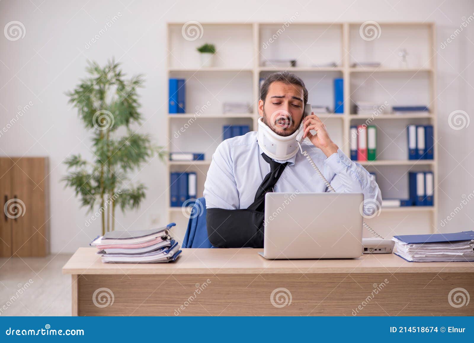 Young Man after Accident Working in the Office Stock Photo - Image of ...