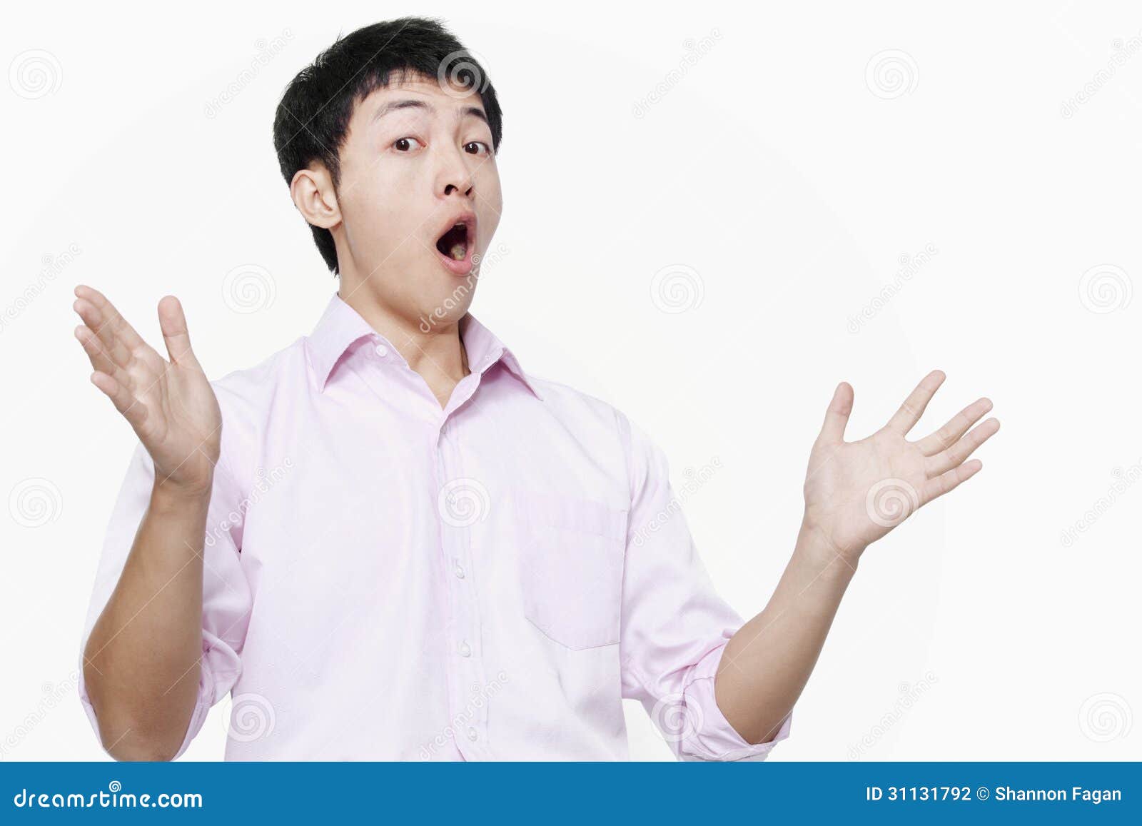 Young Man Acting Surprised, Studio Shot Stock Photo - Image of ...