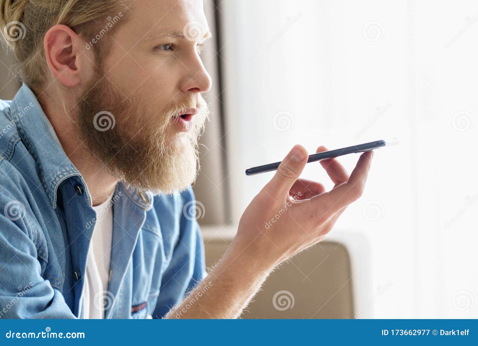 Young Man Activate Virtual Digital Voice Assistant on Mobile Phone ...