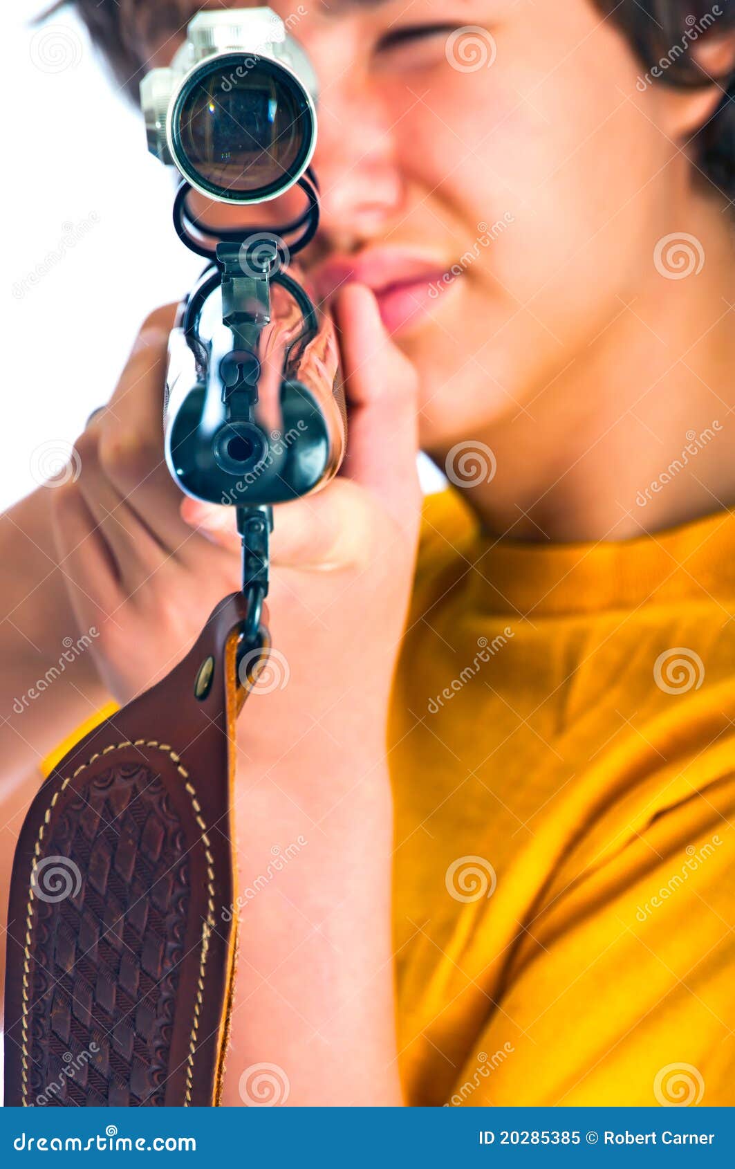 Young man aiming a rifle stock image. Image of caliber - 20285385