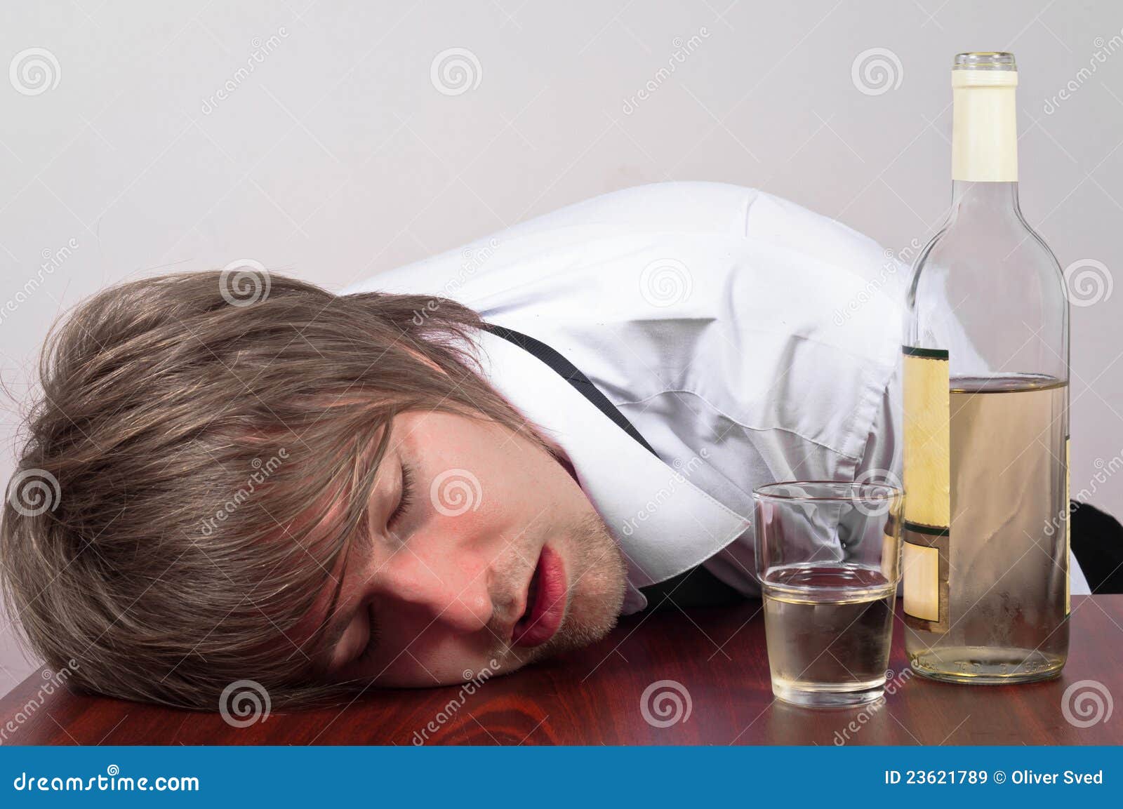 Young man with alcohol stock image. Image of liquor, male - 23621789