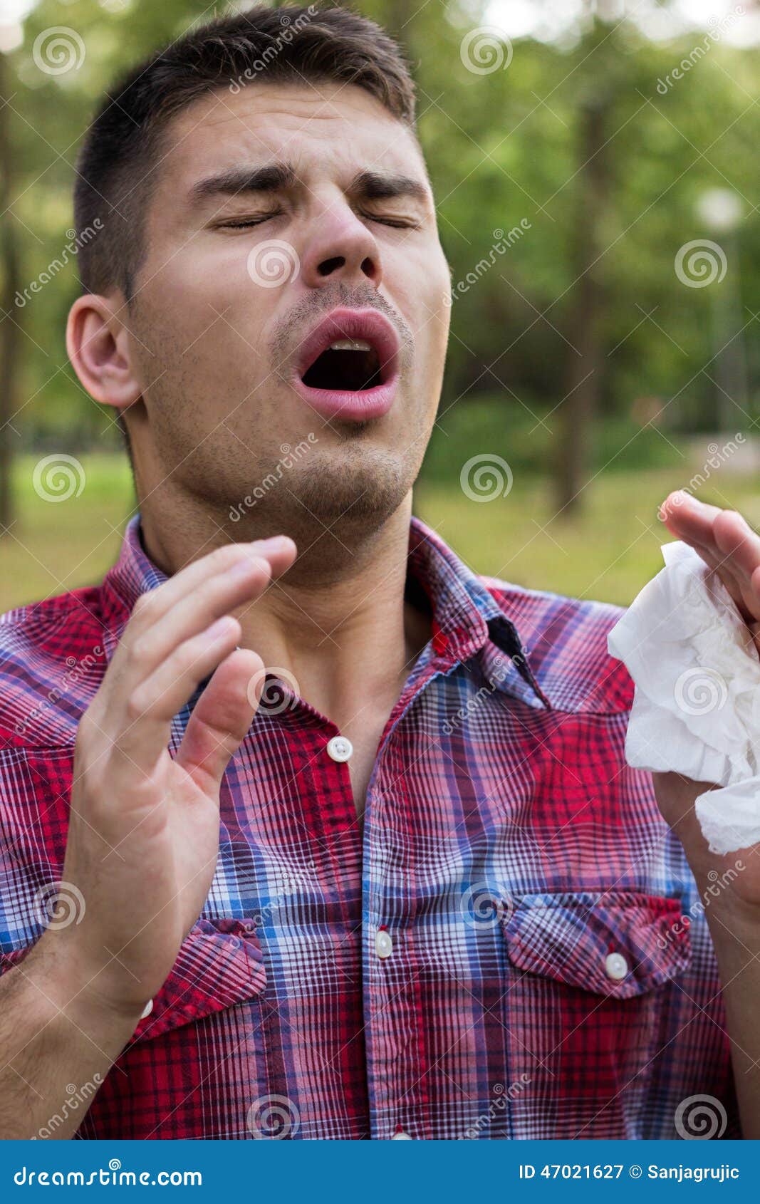 A Young Man with a Allergy Sneezing Stock Image - Image of allergy ...