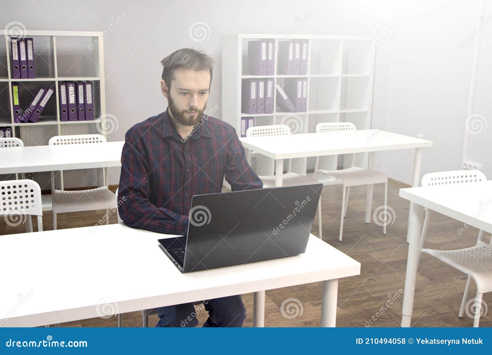 Young Man Alone Working on Computer in Modern Office. Working in Social ...