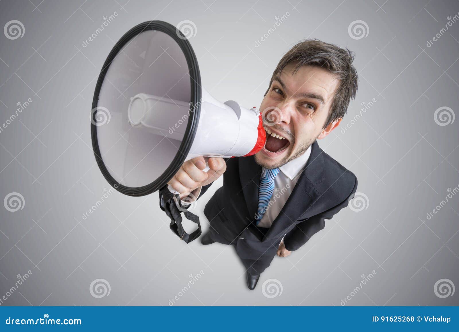Young Man is Announcing a Message with Megaphone. View from Above Stock ...