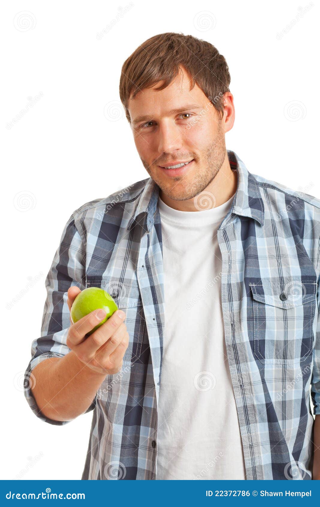 Young man with apple stock photo. Image of hand, happy - 22372786