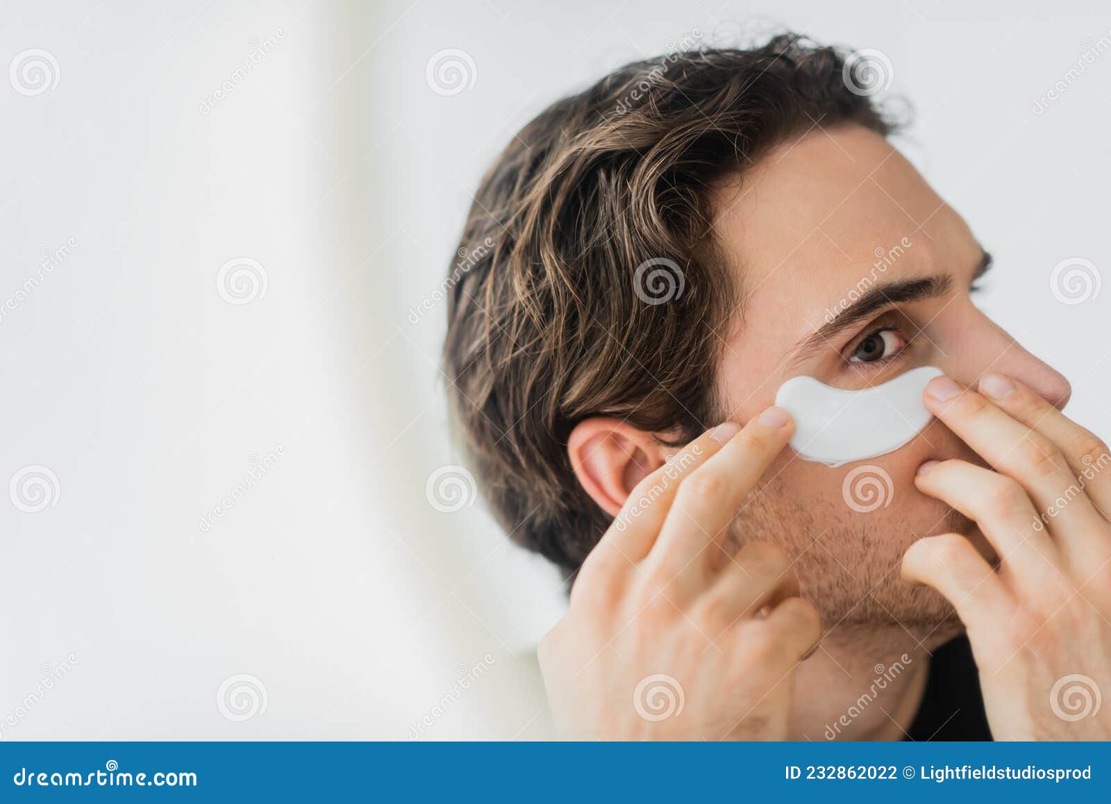 Young Man Applying Eye Patch on Stock Photo - Image of mirror, home ...