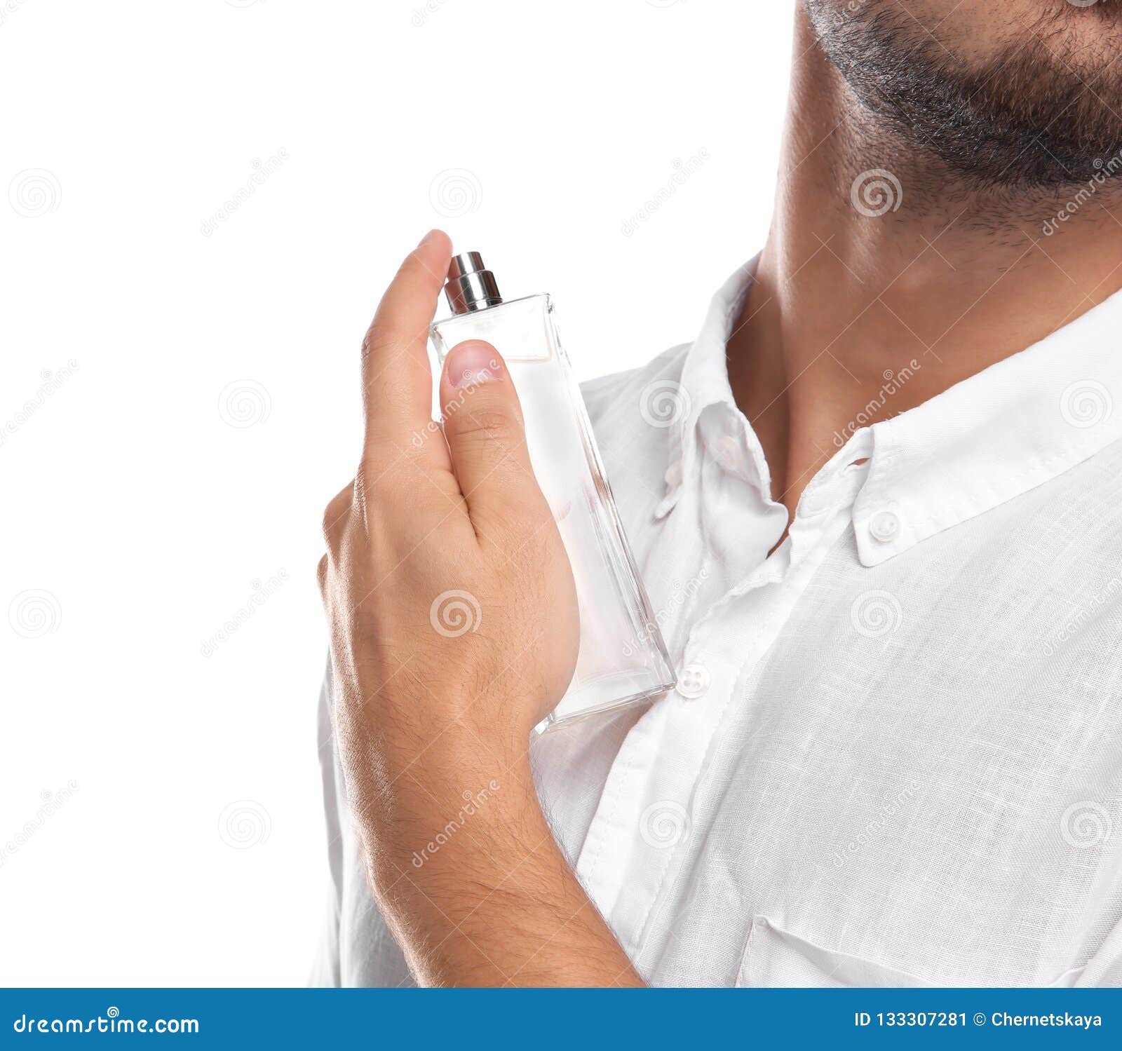 Young Man Applying Perfume on White Background Stock Image - Image of ...