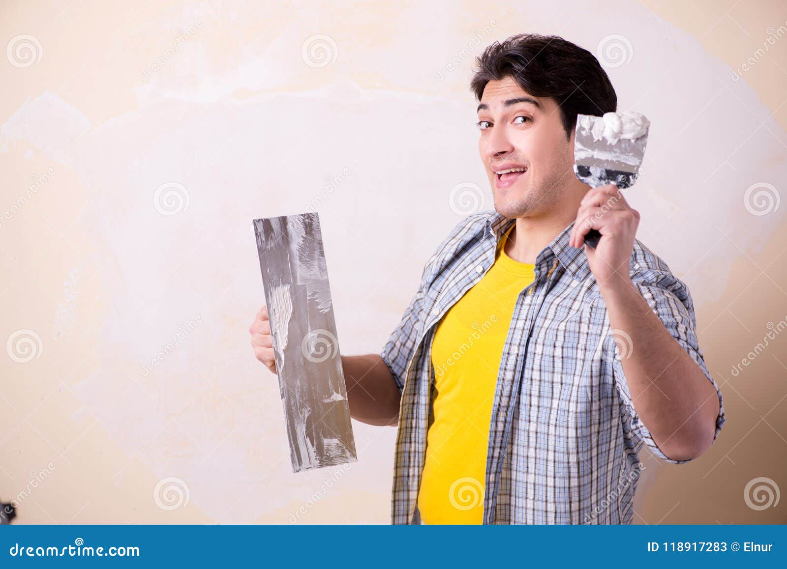 The Young Man Applying Plaster on Wall at Home Stock Image - Image of ...