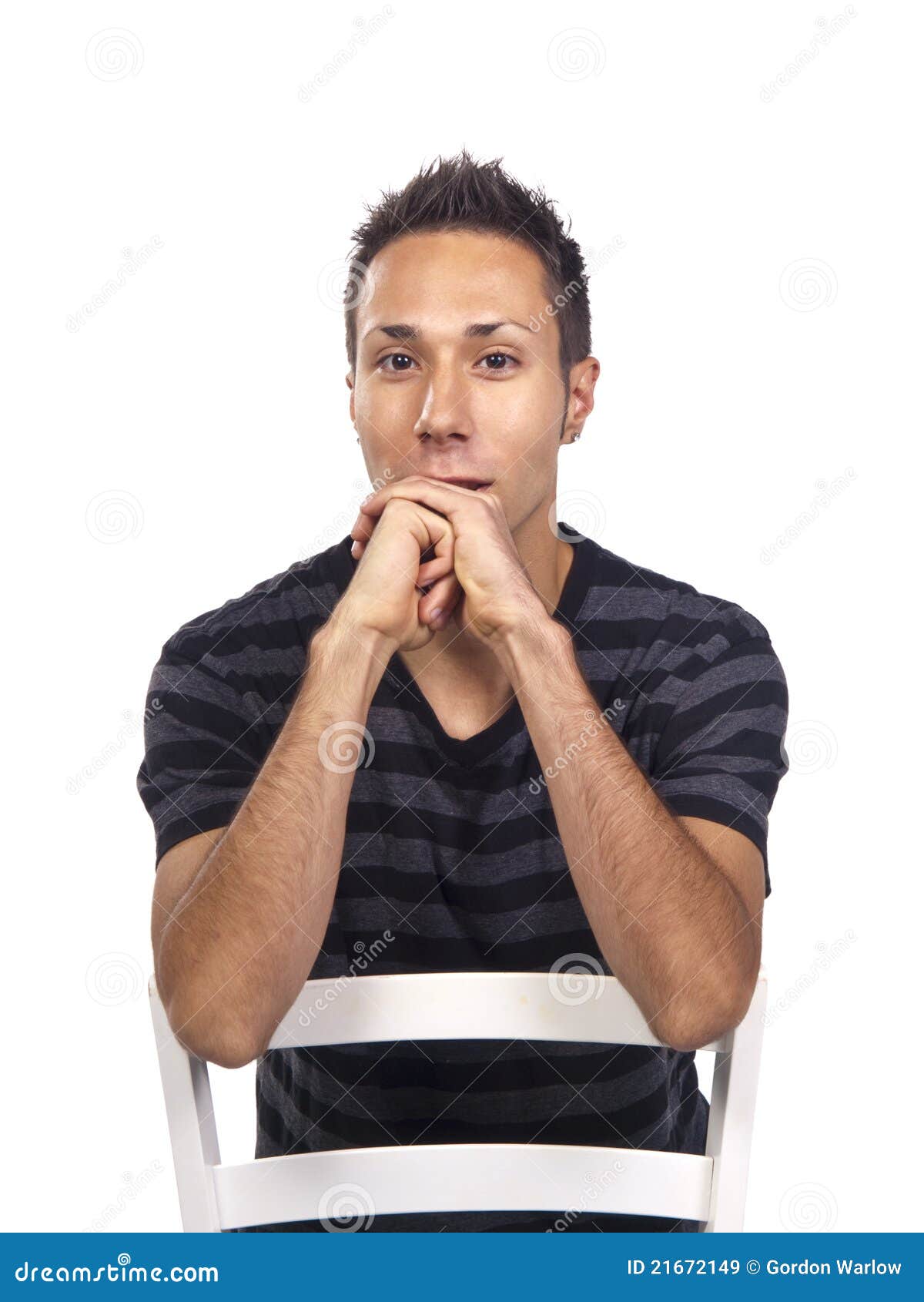 Young Man with Arms Resting on a White Chair Stock Image - Image of ...