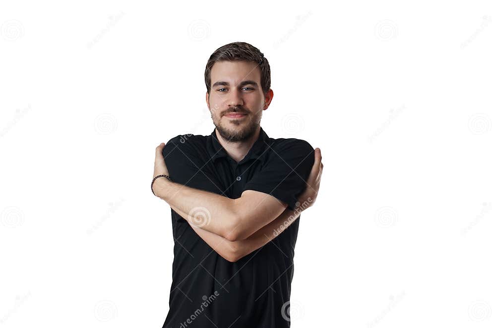 Young Man with Arms Wrapped Around Himself Stock Photo - Image of ...