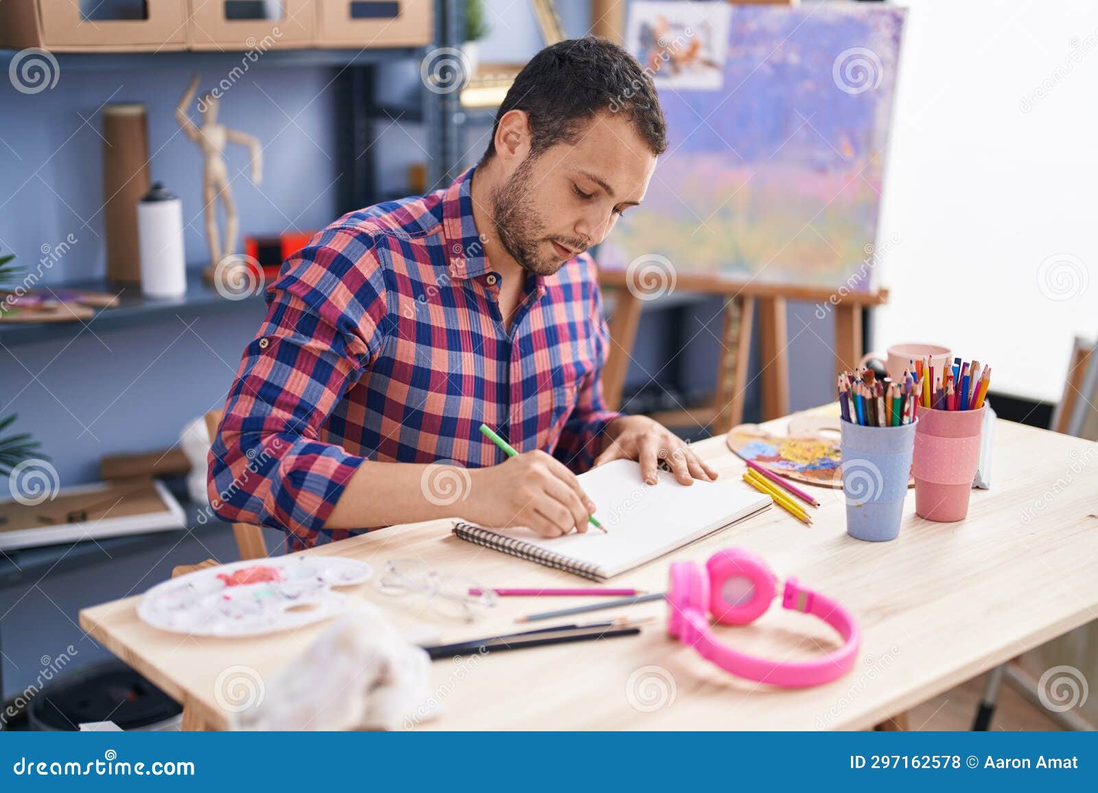 Young Man Artist Drawing on Notebook at Art Studio Stock Photo - Image ...