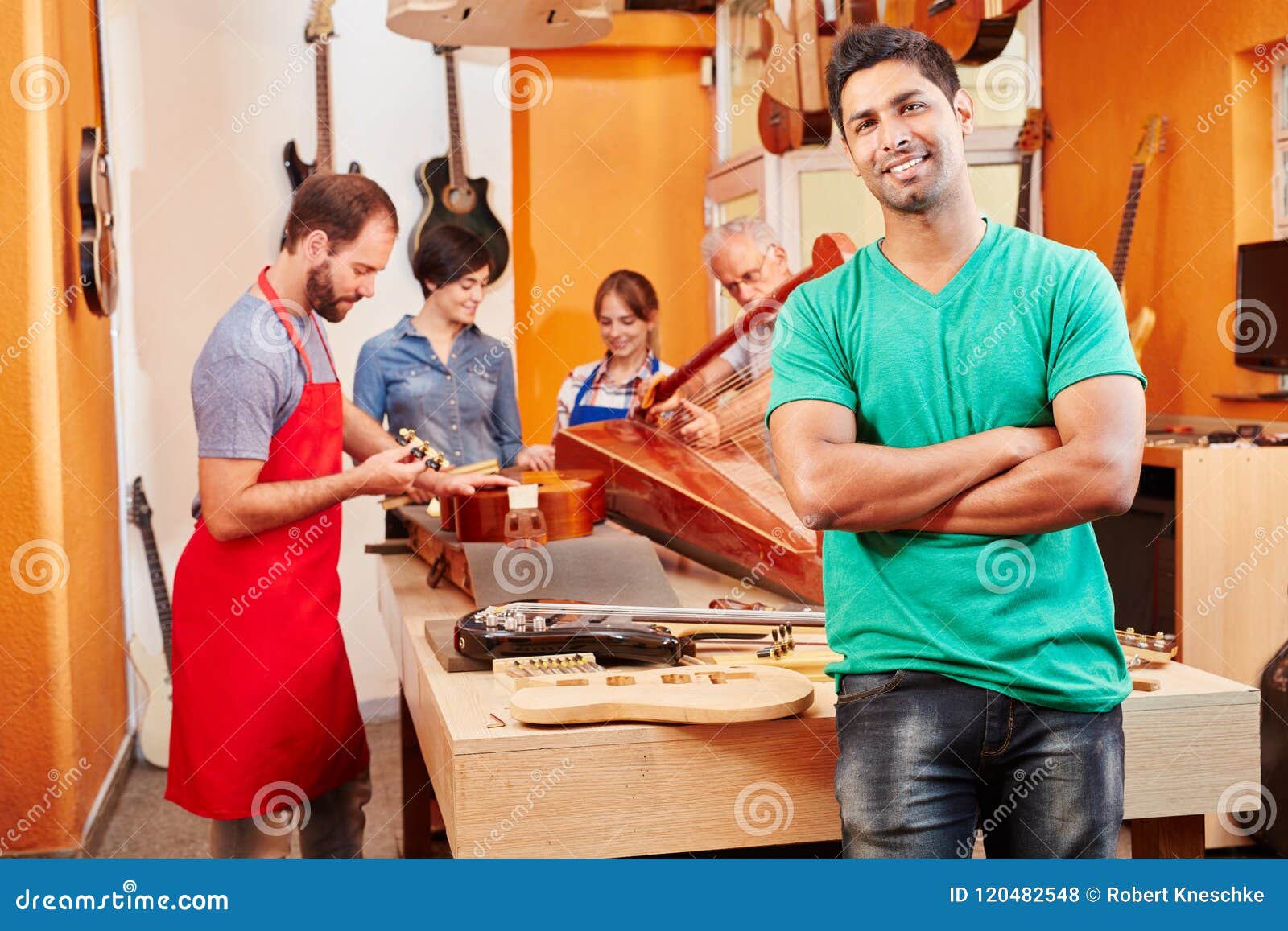 Young man as apprentice stock photo. Image of carpenter - 120482548