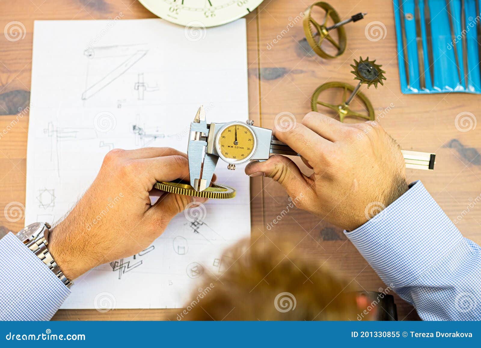 Young Man Assembling Mechanical Watch. Watch Production. Mans Hands ...