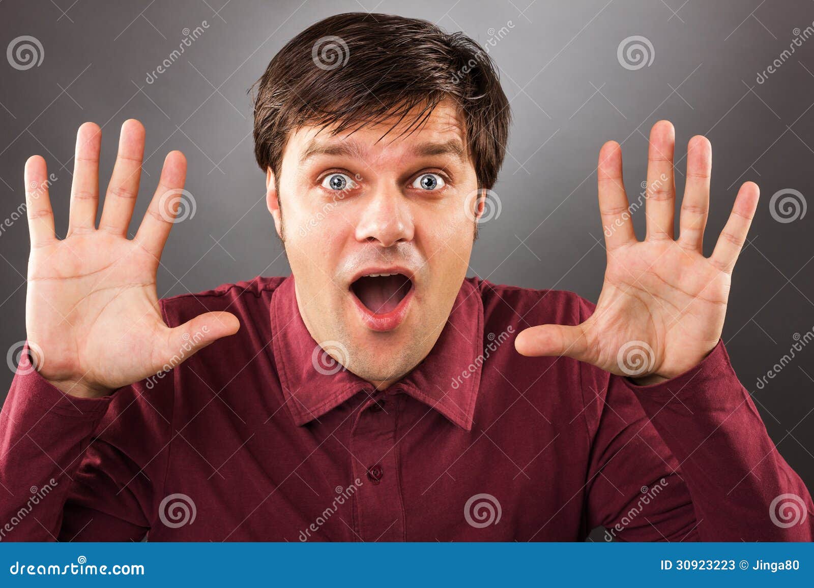 Young Man with Astonished Expression and Hands Up Stock Image - Image ...