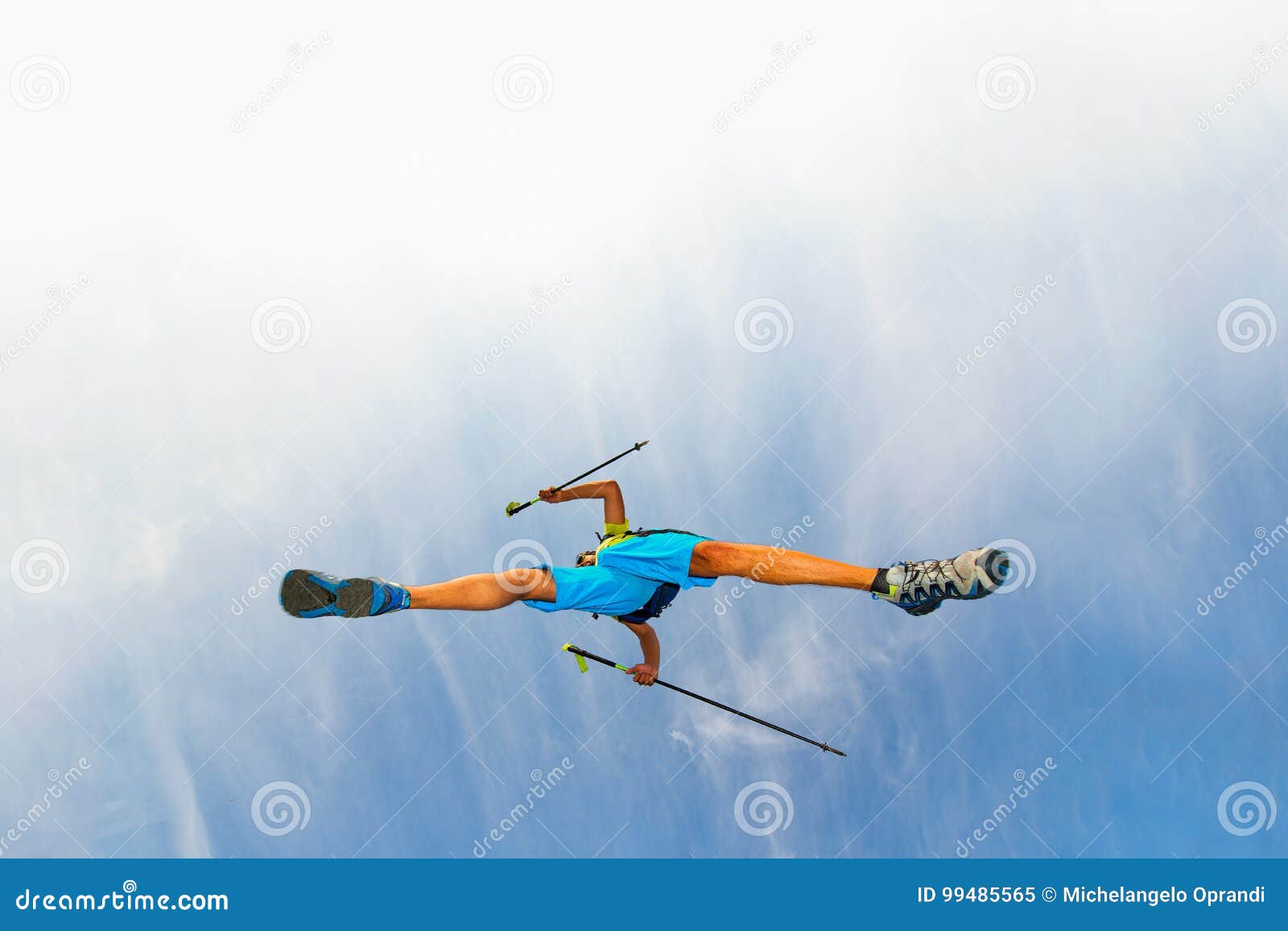 Young Man Athlete Makes a Jump with Nordic Walking Sticks Stock Image ...