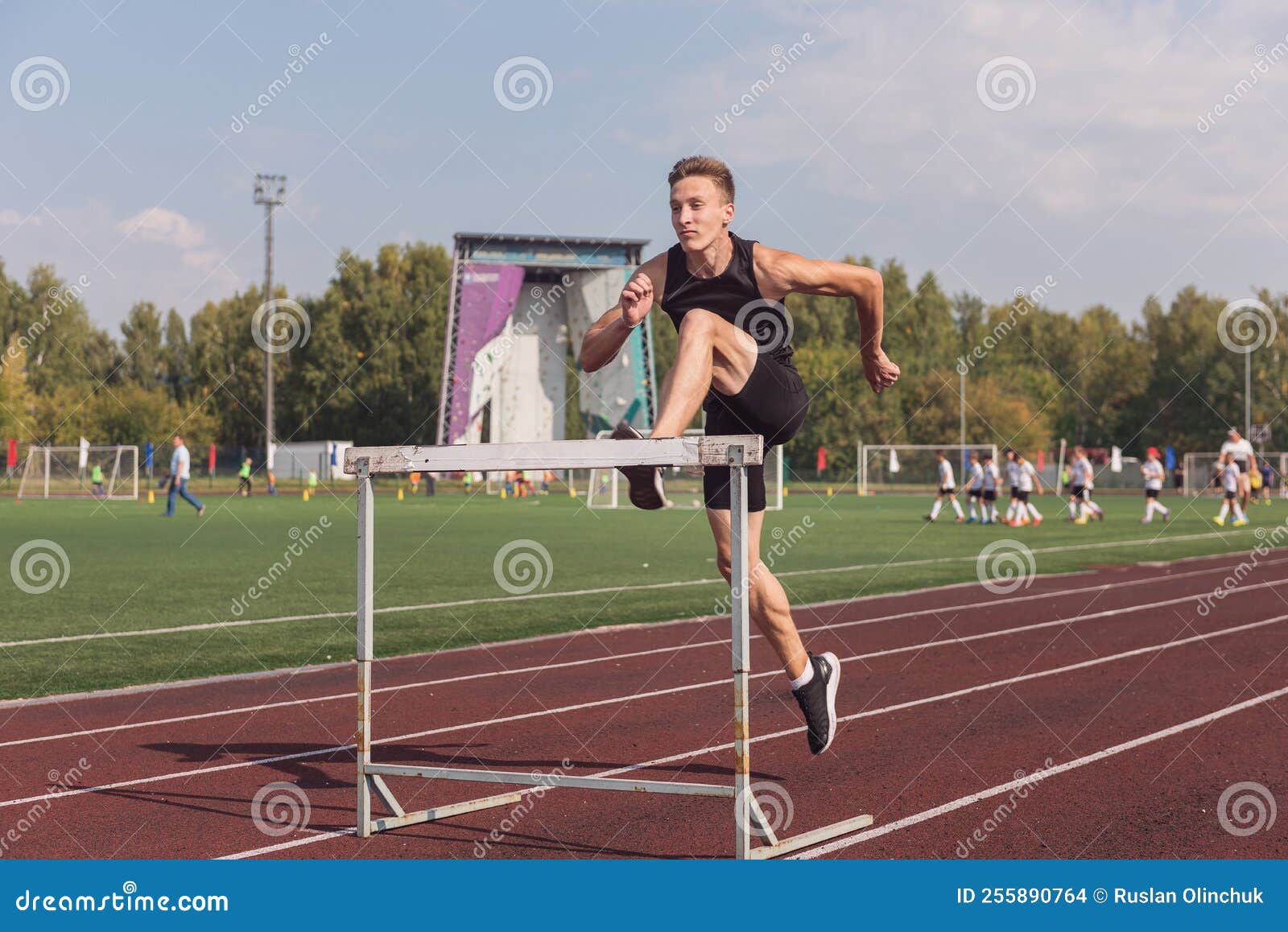 Young Man Athlete Runnner Running Hurdles Stock Photo - Image of ...