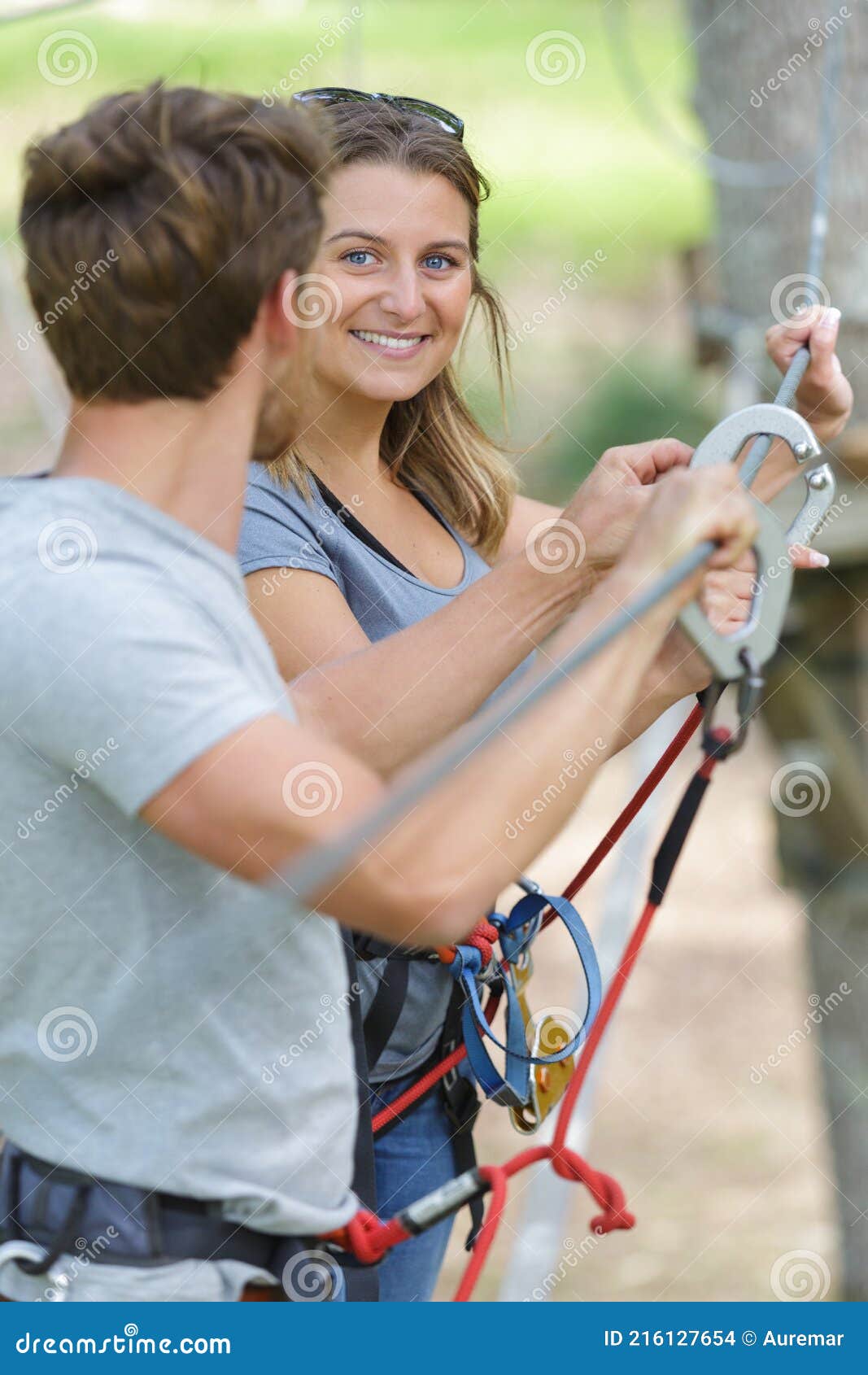 Man Attaching Harness Onto Female Skydiver Royalty-Free Stock Photo ...