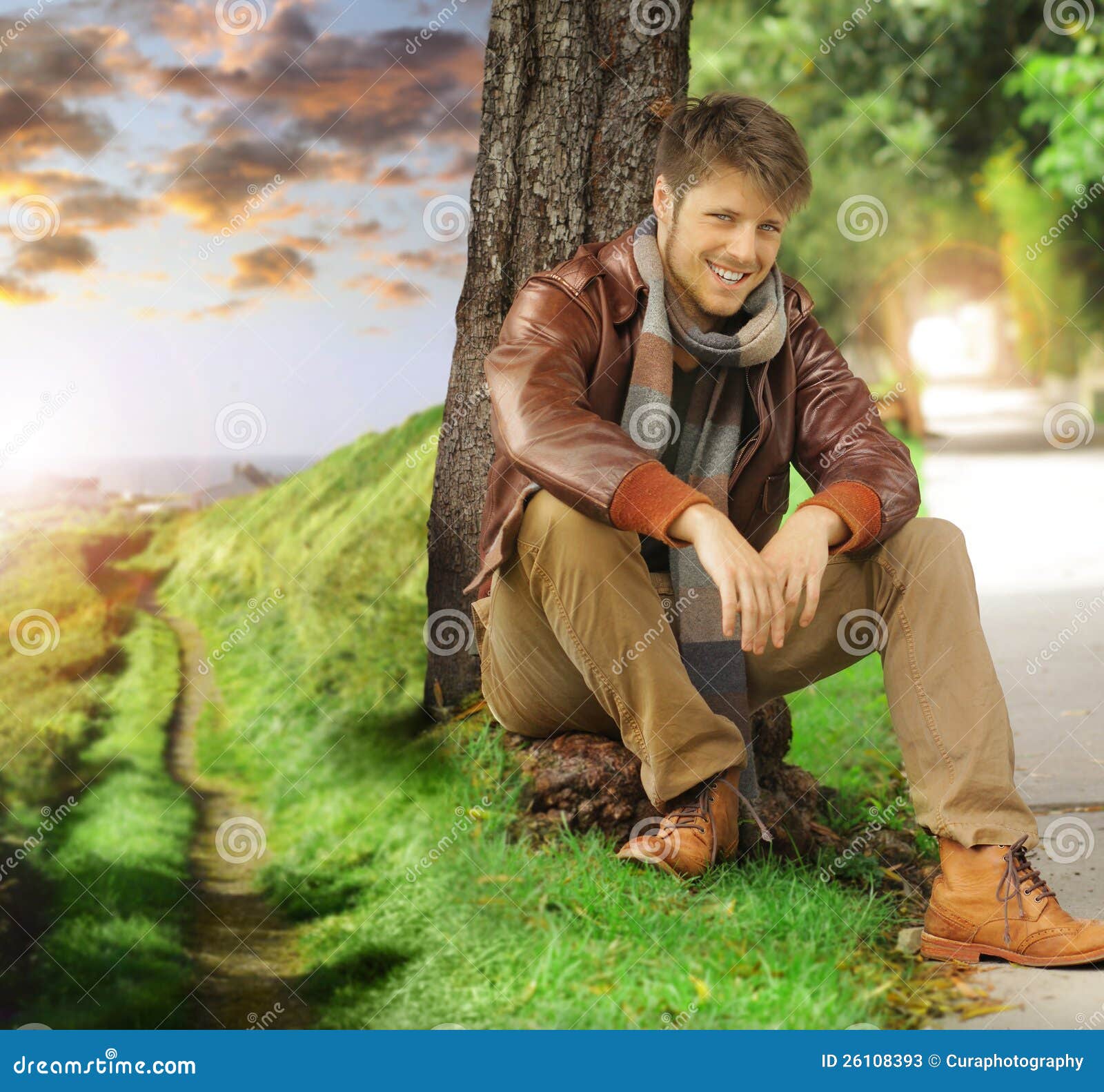 Young man in autumn stock image. Image of cheerful, handsome - 26108393