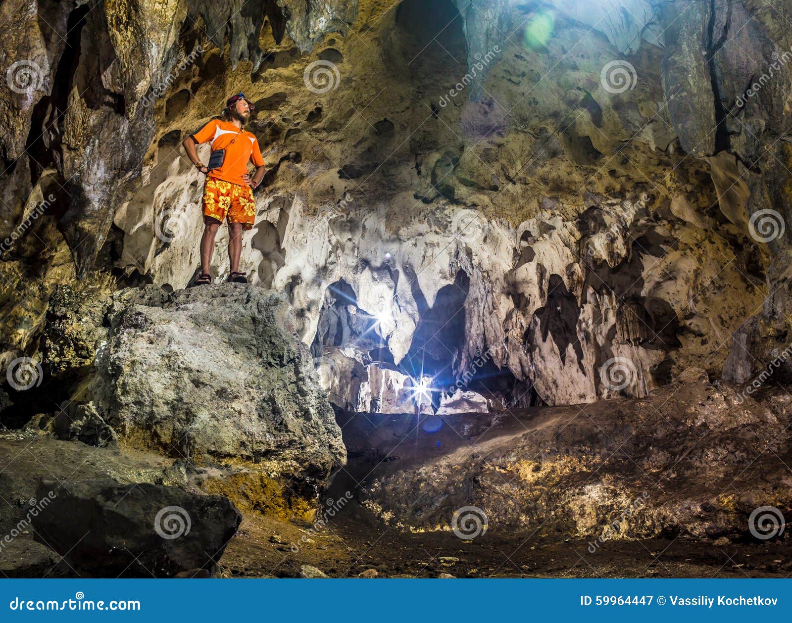 Young Man with Backpack Exploring Cave Stock Image - Image of ...